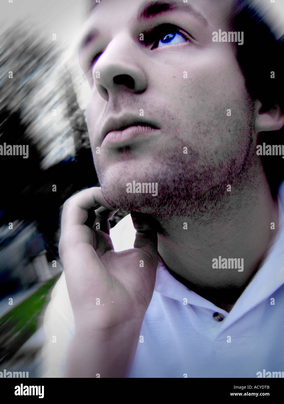 young man looking pensive Stock Photo - Alamy