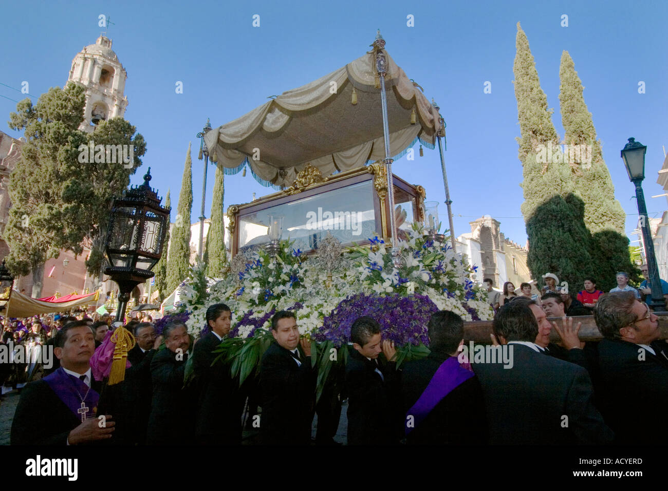 MEXICAN MEN carry CHRIST in his casket from TEMPLO DEL ORATORIO during ...