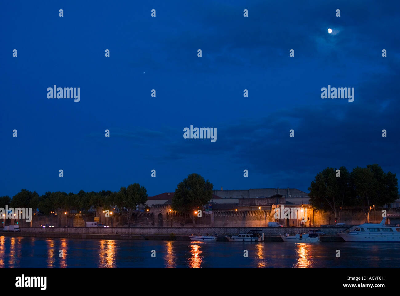 Avignon France the city at dusk with moonlight Stock Photo - Alamy