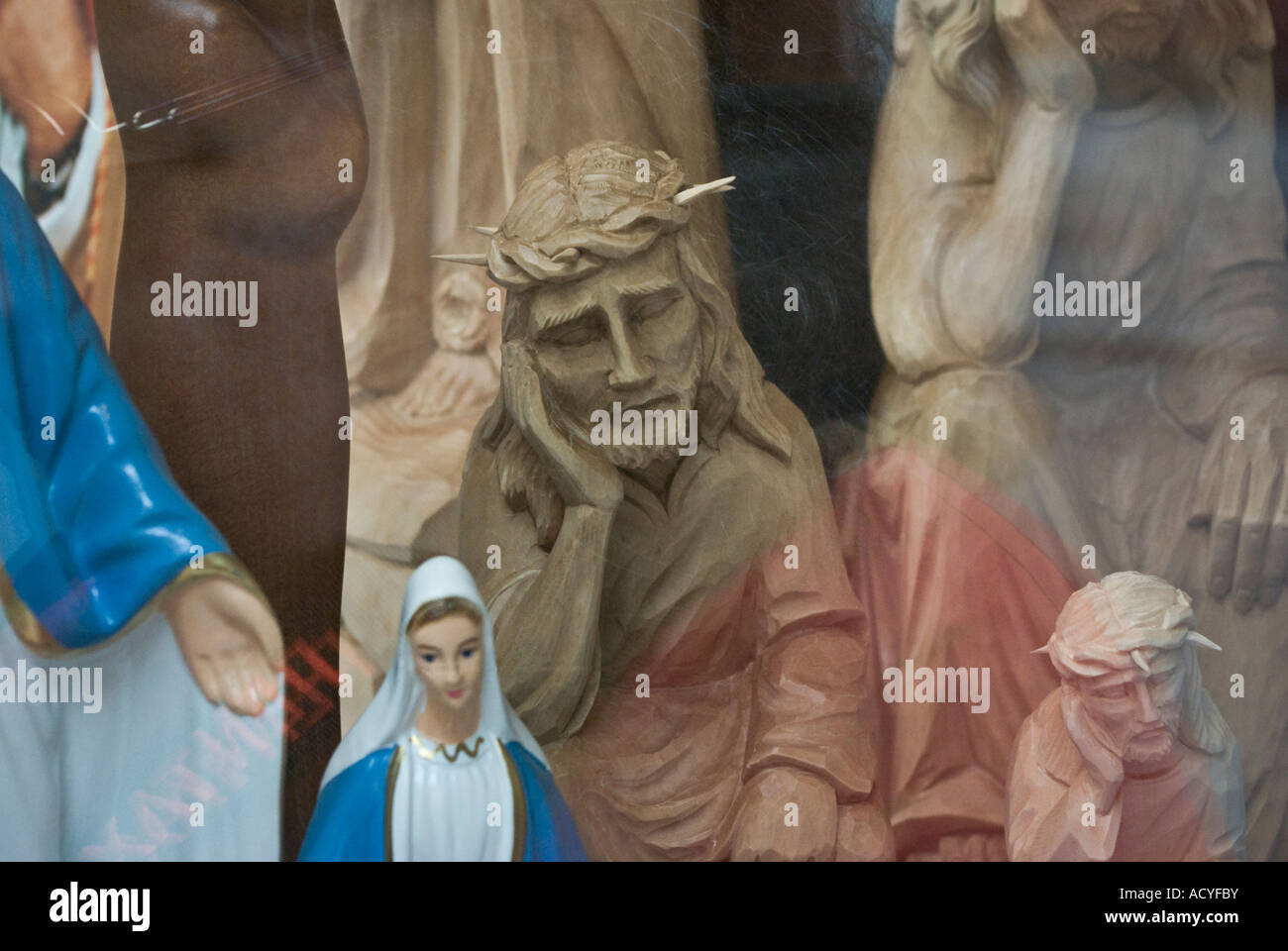 detail of Roman Catholic icons in the window of a store selling ...