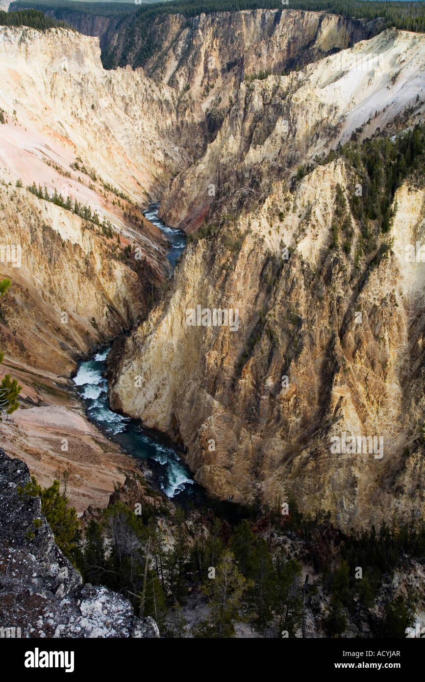 The Yellowstone River and canyon, the multi colored rock formations ...