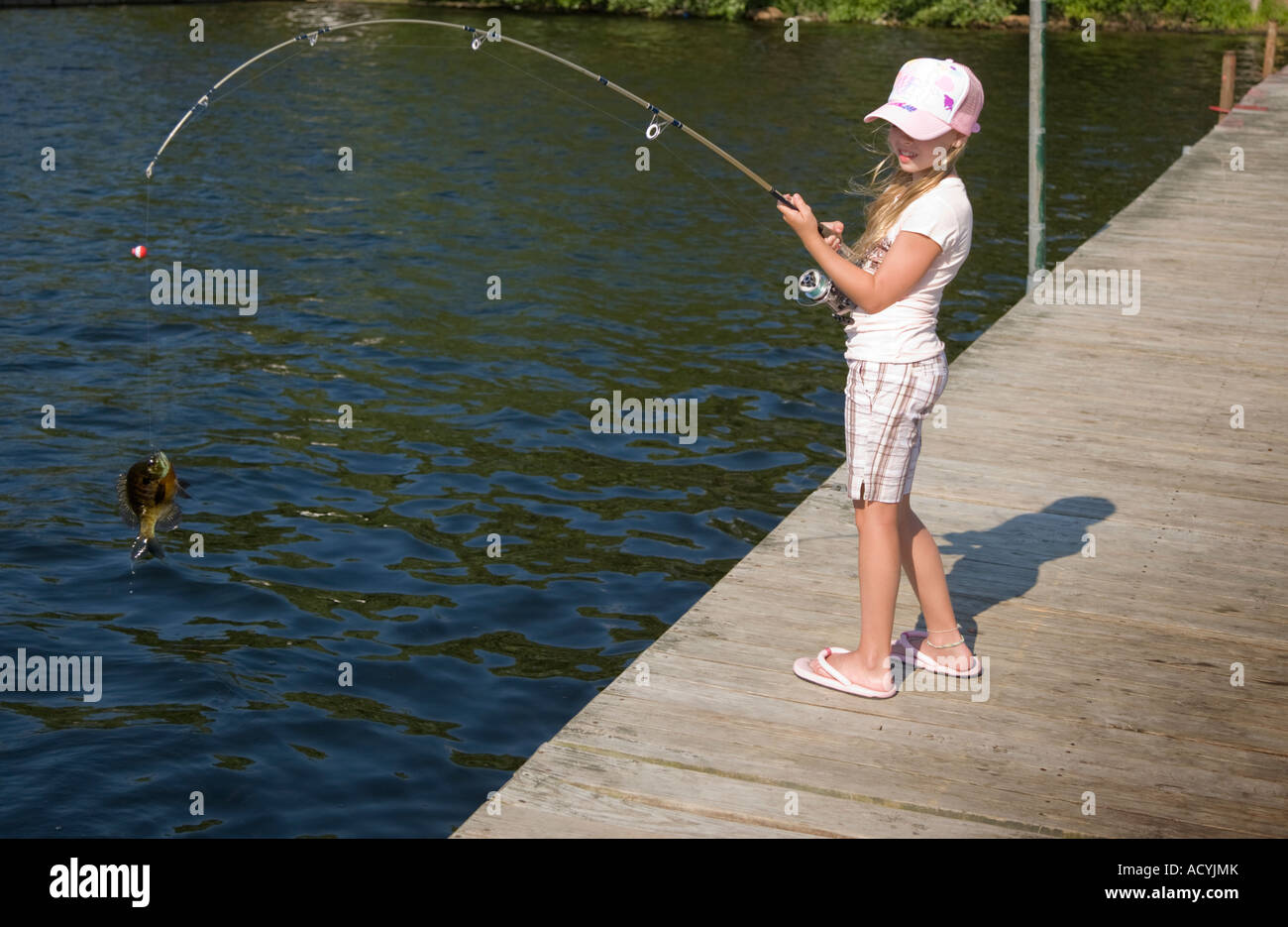 Child catching a fish Stock Photo - Alamy