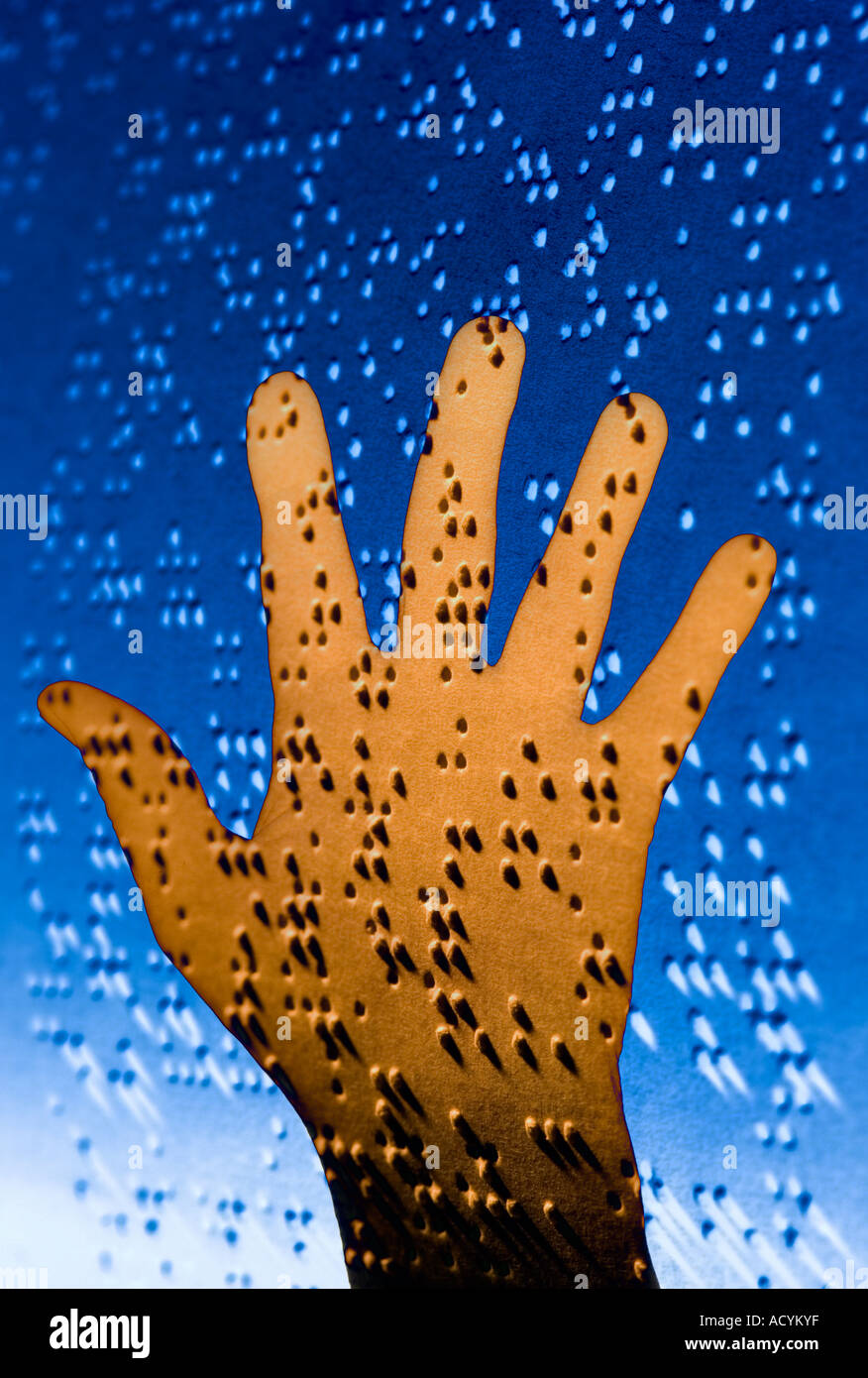 conceptual view of a human hand composited on sheet of Braille text for ...