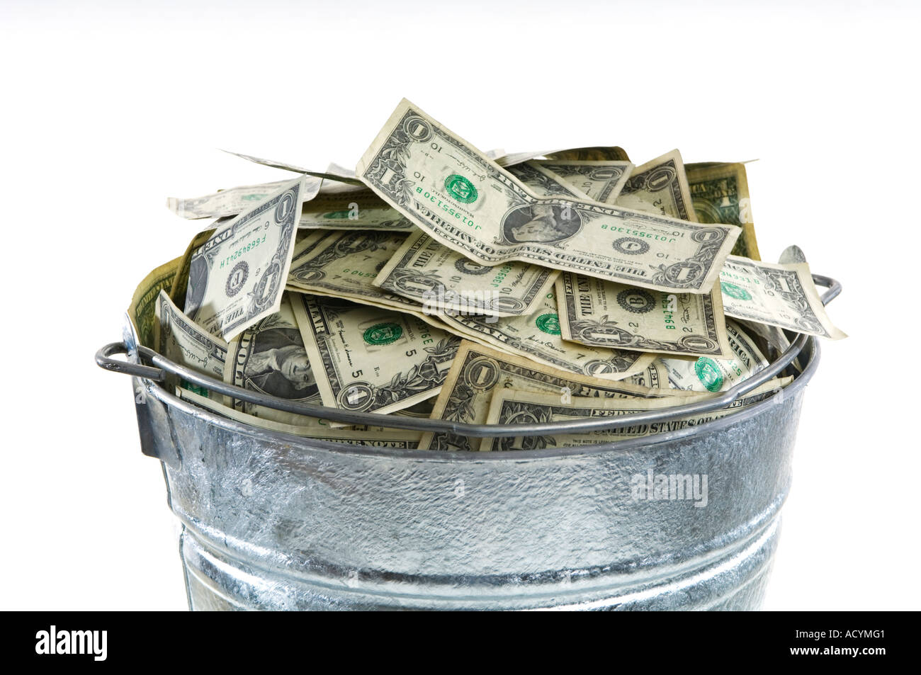bucket full of money Stock Photo - Alamy