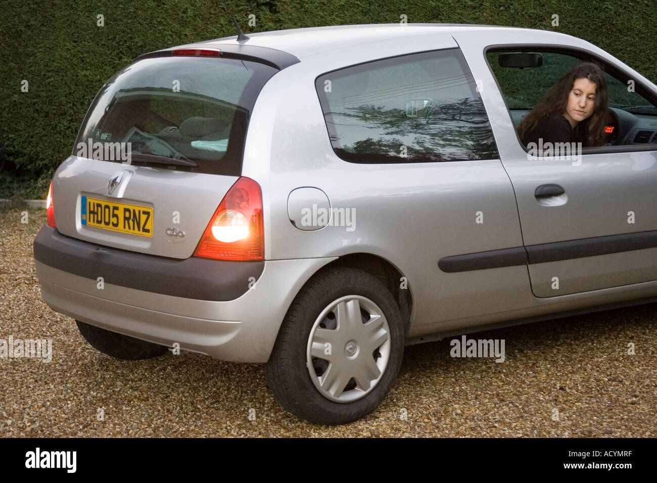 Woman Driving Reversing Car Looking High Resolution Stock Photography ...