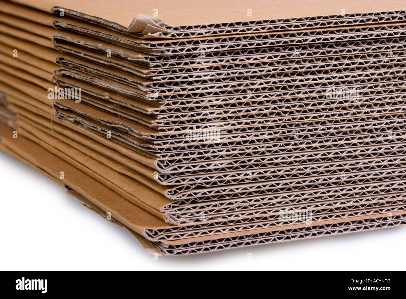 Stack of flat packed corrugated packaging Stock Photo - Alamy