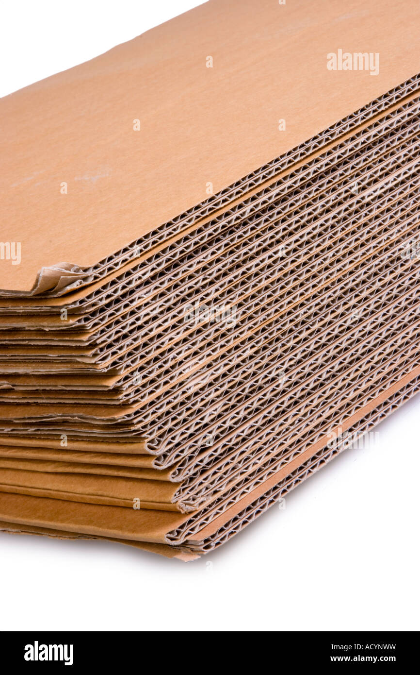 Stack of flat packed corrugated packaging Stock Photo - Alamy