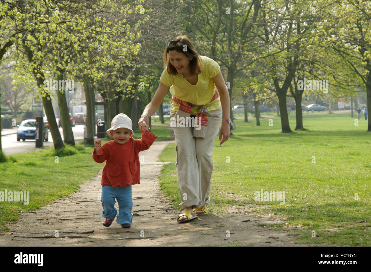 First steps toddler walking for first time Stock Photo - Alamy