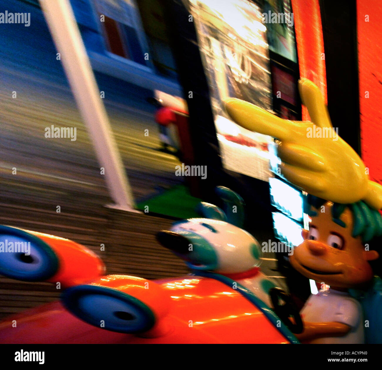 fairground characters on ride Stock Photo - Alamy