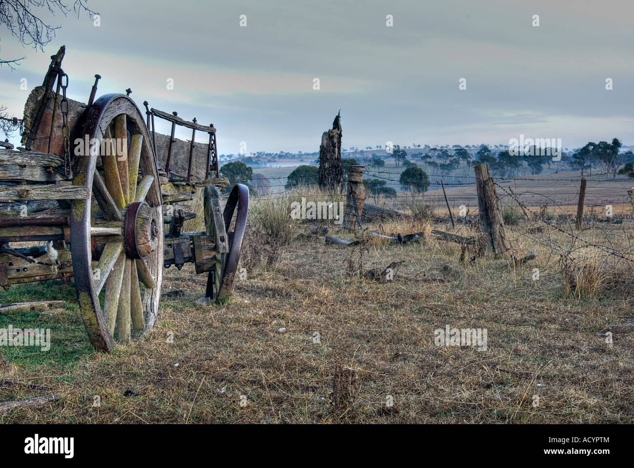 a landscape view of paddock and old forgotten cart Stock Photo - Alamy