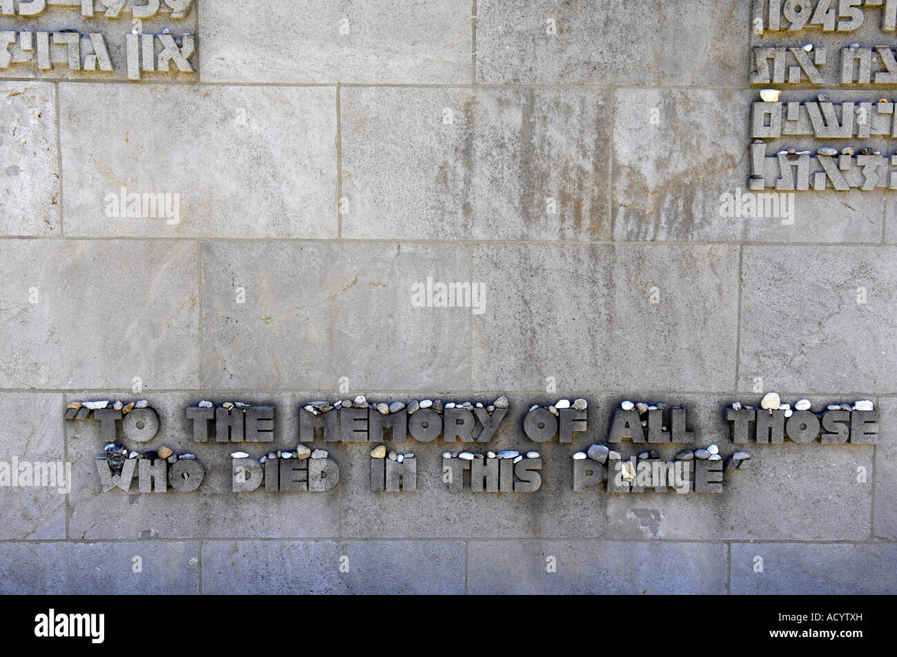 memory text script font cenotaph bergen belsen lower saxony germany ...
