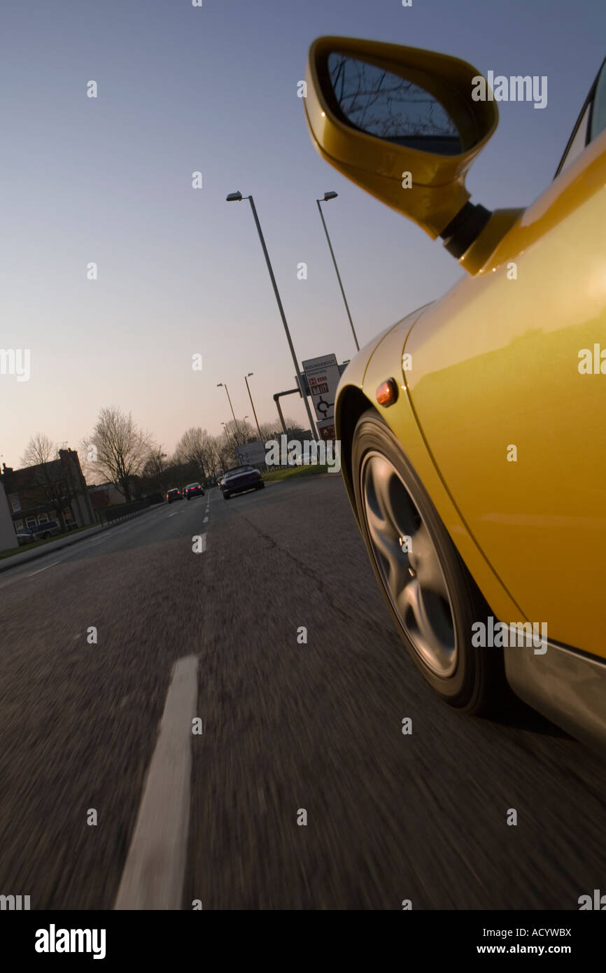 Car cruising down street hi-res stock photography and images - Alamy