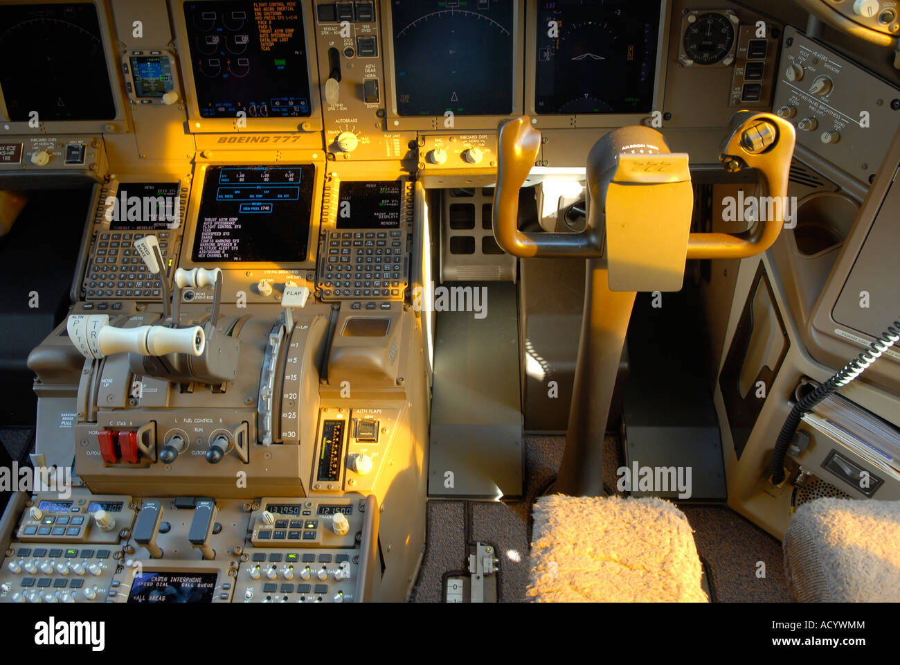 Cockpit panel of Boeing 777 aircraft, showing instrumentation dials and ... Cockpit panel of Boeing 777 aircraft, showing instrumentation dials and ...