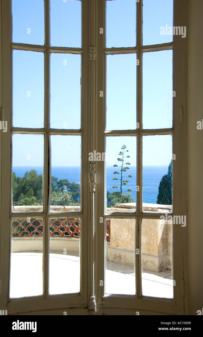 Dream vision of the Mediterranean sea through a window pane Stock Photo ...