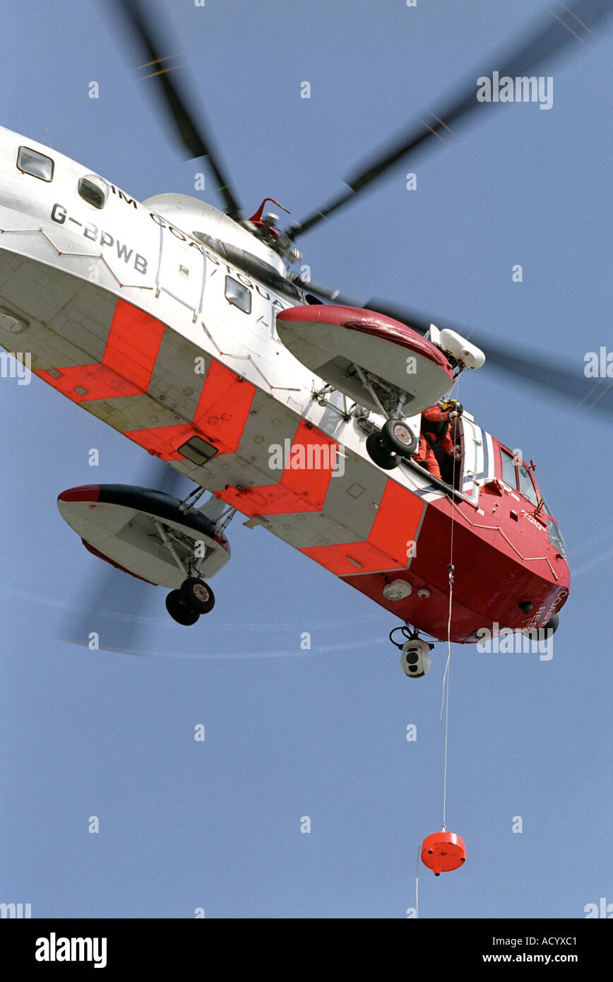 Coastguard Rescue Helicopter resetting its winch Stock Photo - Alamy