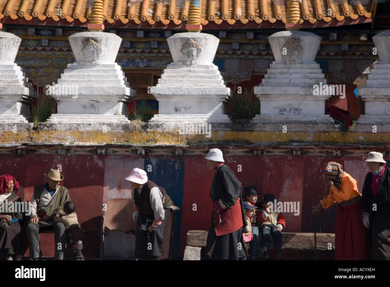 Tibetans outside a Buddhist monastery in Kham, a Tibetan region of ...