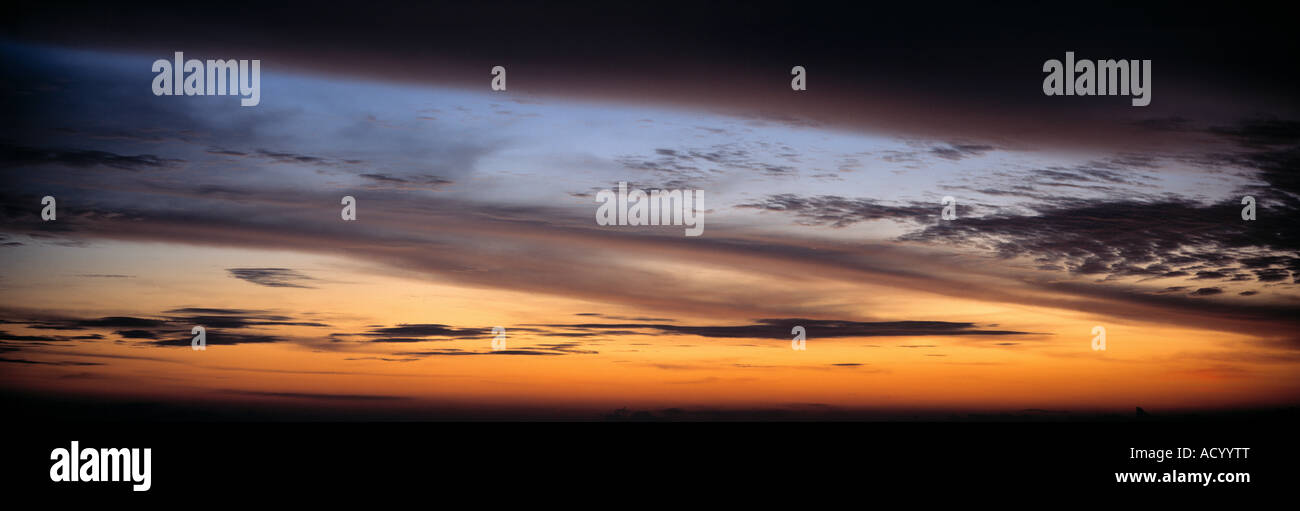 Horizontal frame of daylight sunset clouds and sunset hi-res stock ...