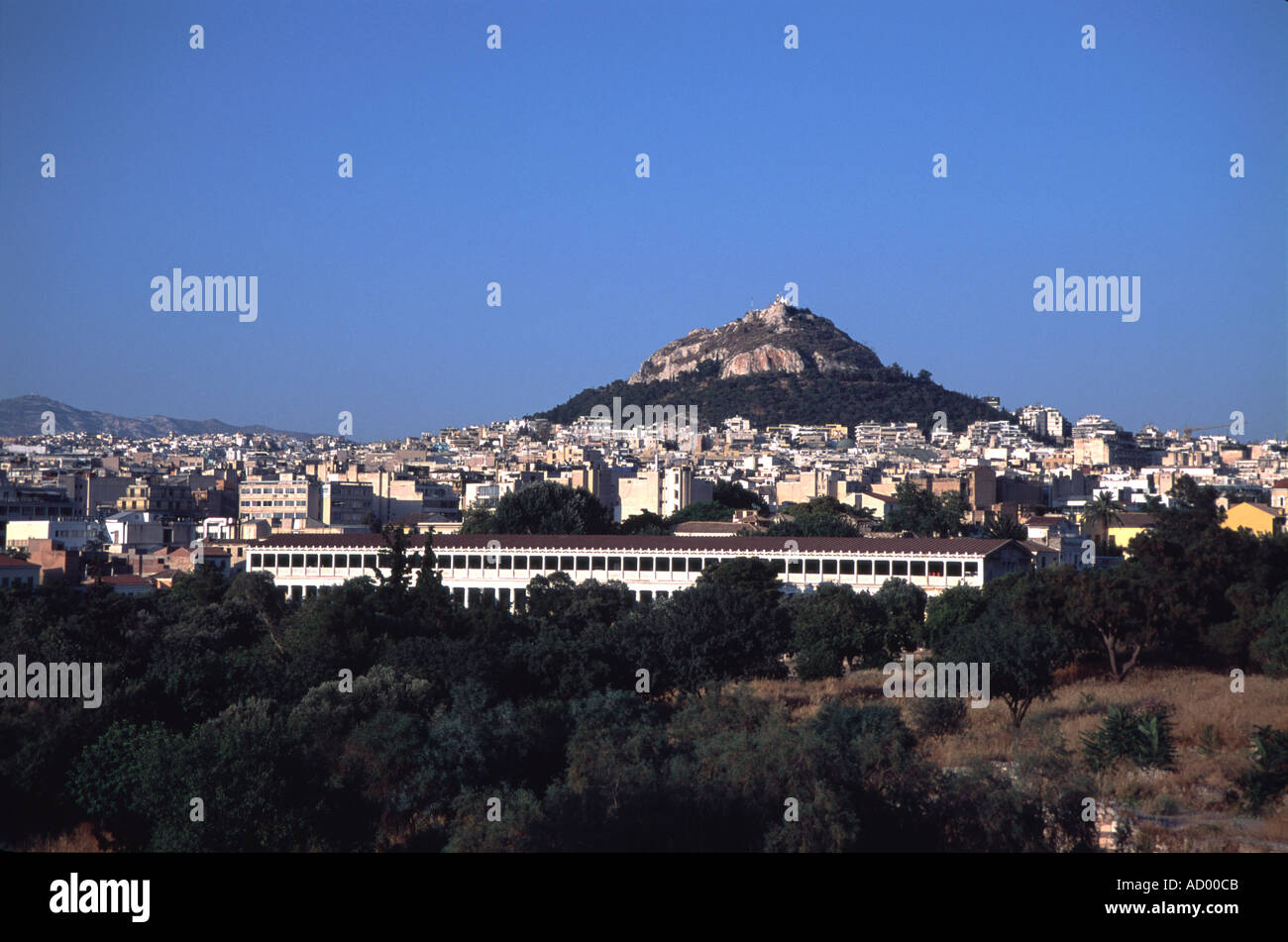 View of the Stoa of Attalus Museum and Filopappos Hill on background ...