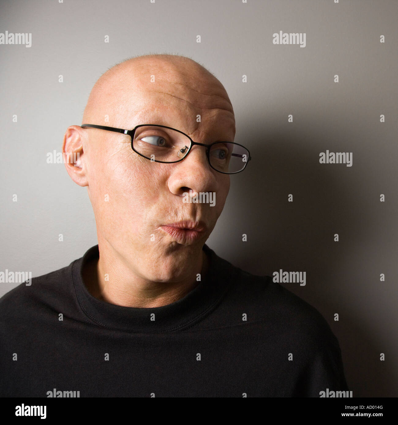 Portrait of mid adult Caucasian male with puckered lips Stock Photo - Alamy