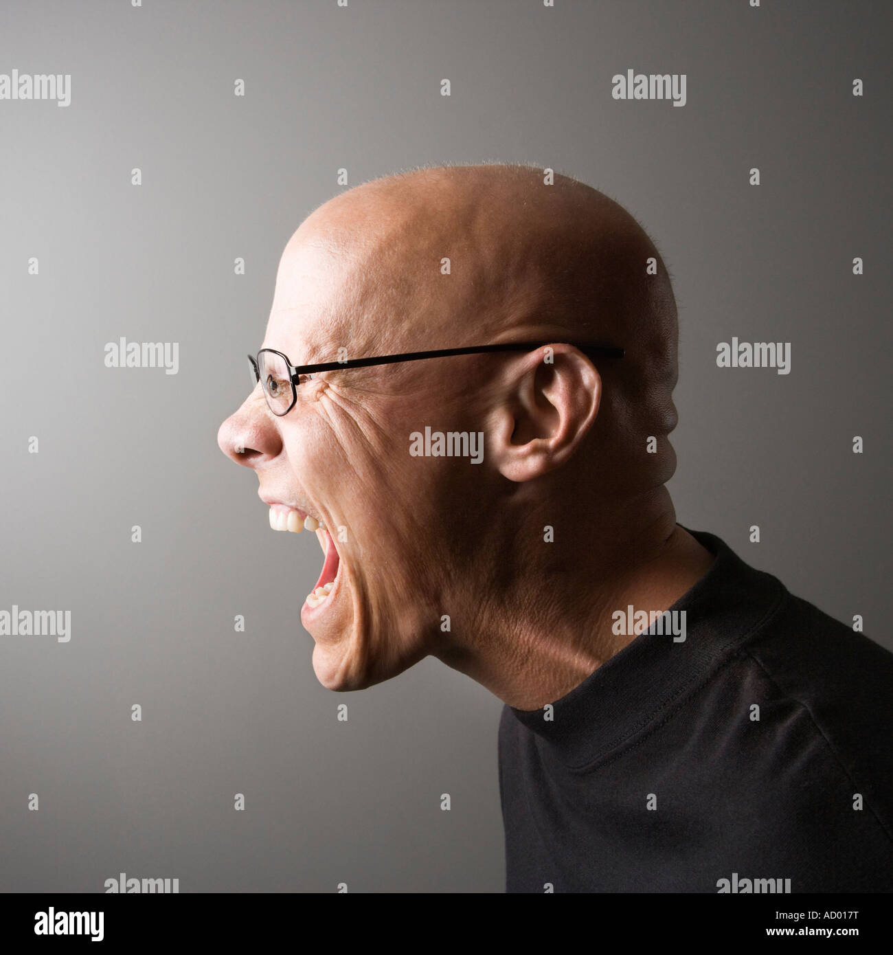 Profile portrait of mid adult Caucasian male screaming Stock Photo - Alamy