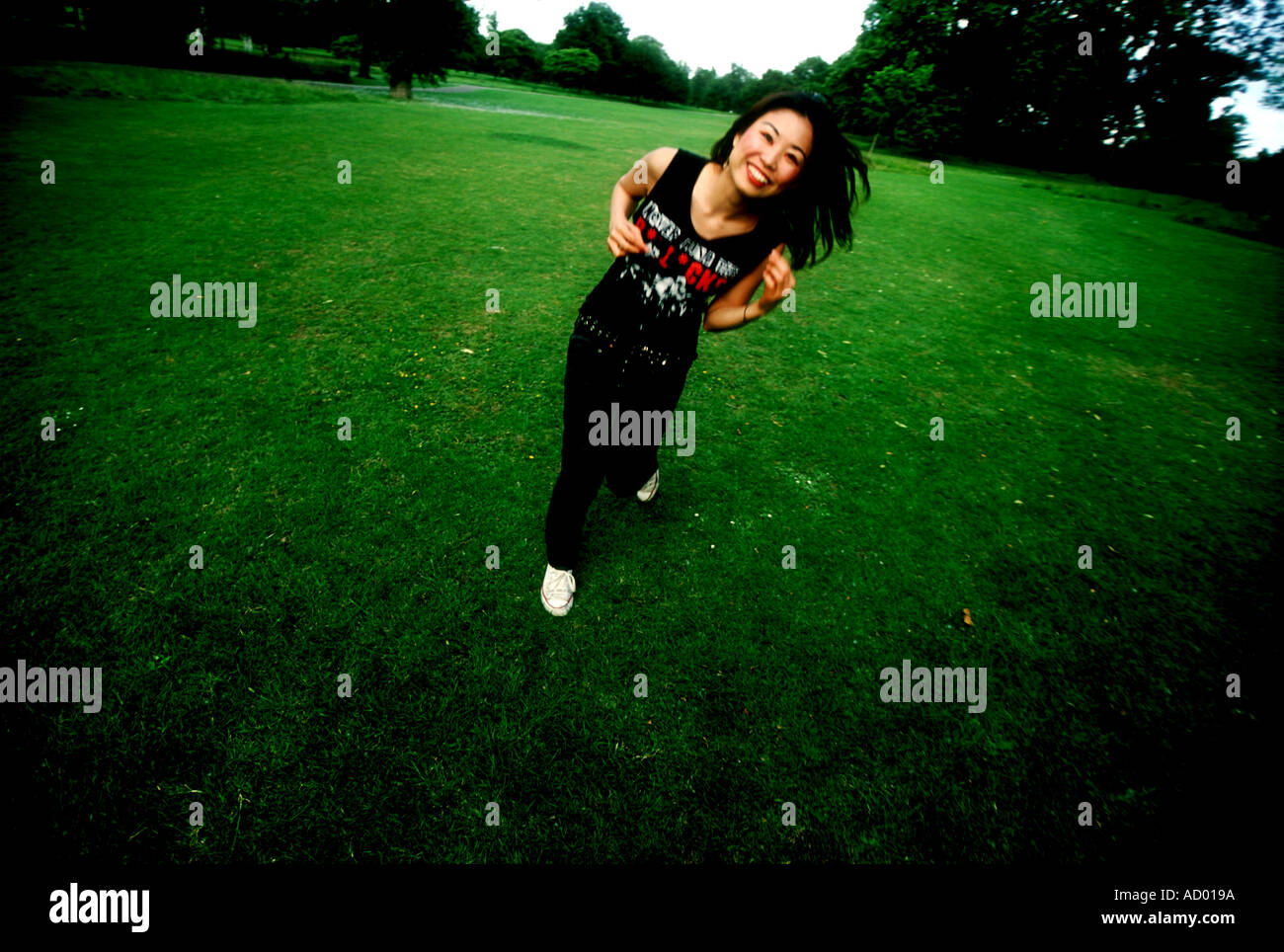 girl running towards camera Stock Photo - Alamy