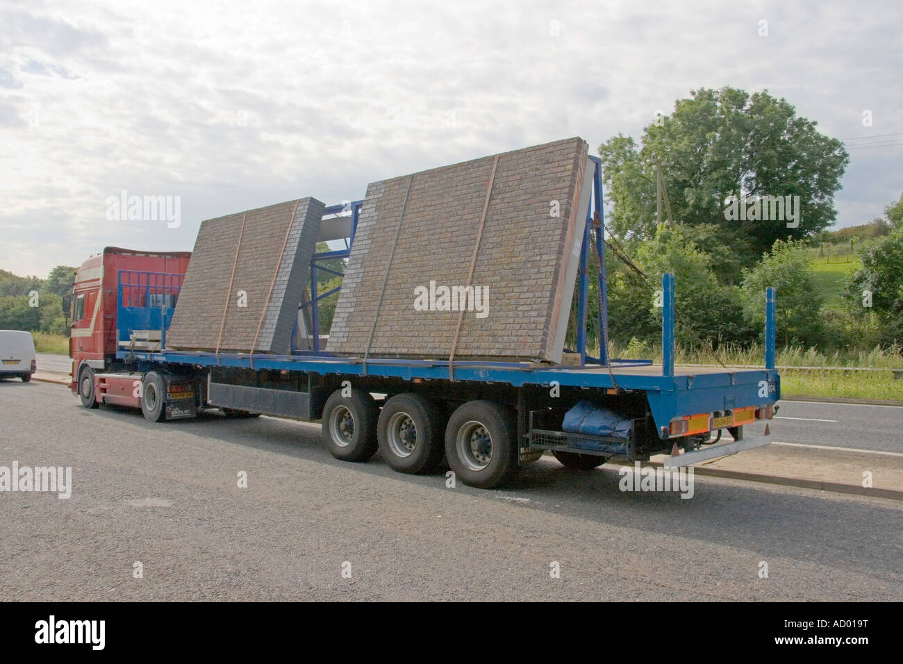 Pre cast brick cladding panels in transit loaded on a lorry Stock Photo ...