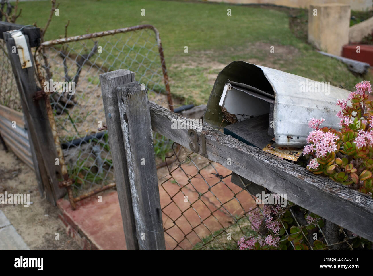 old fence, gate and letterbox Stock Photo - Alamy