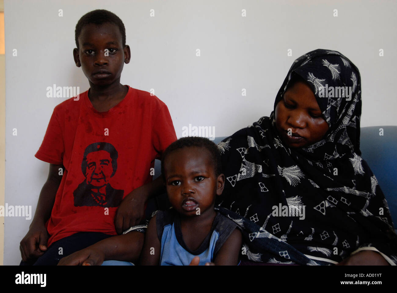A Sudanese asylum seeker who crossed the border from Egypt poses with ...