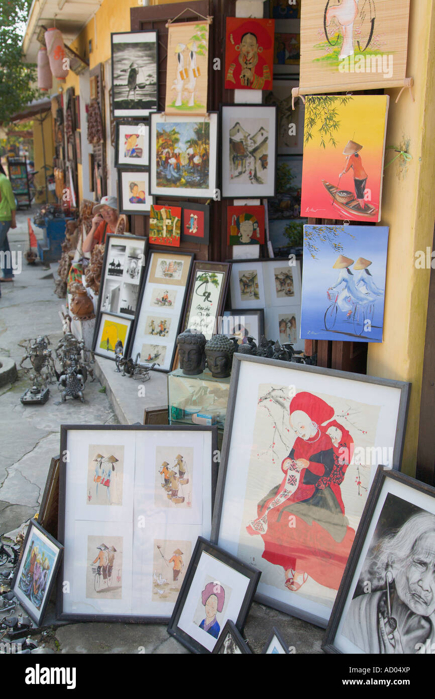 Paintings displayed outside art shop "Hoi An" Vietnam Stock Photo - Alamy