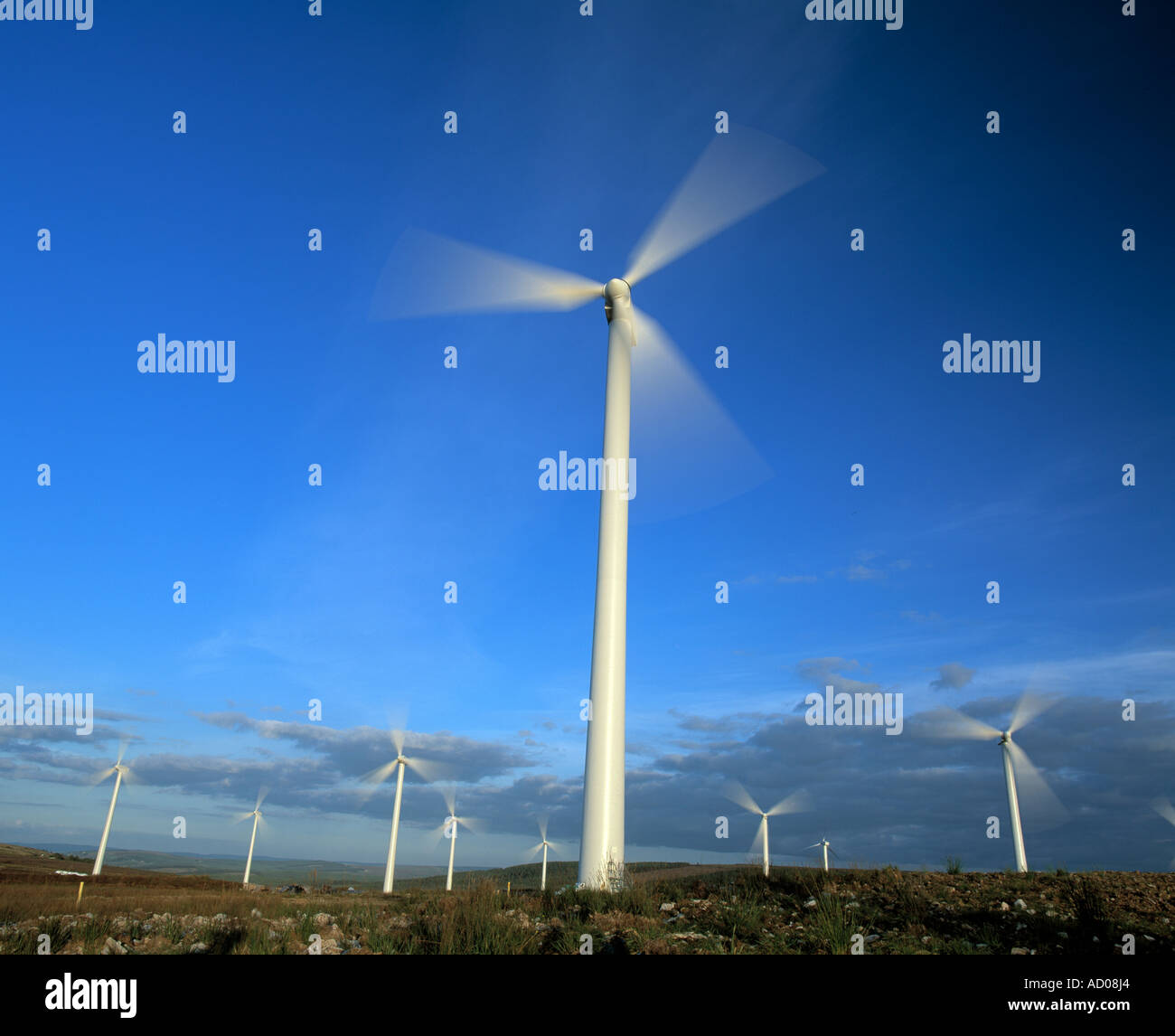 wind generating windmills/turbines in motion/rotation Stock Photo - Alamy