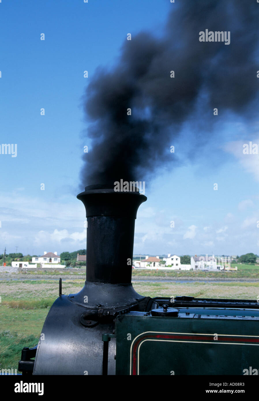 famous old steam engine puffing in the irish landscape Stock Photo - Alamy