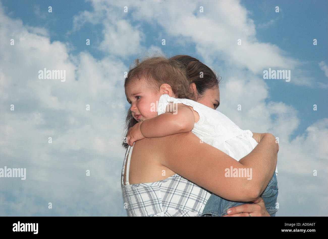 Mother embracing baby hi-res stock photography and images - Alamy
