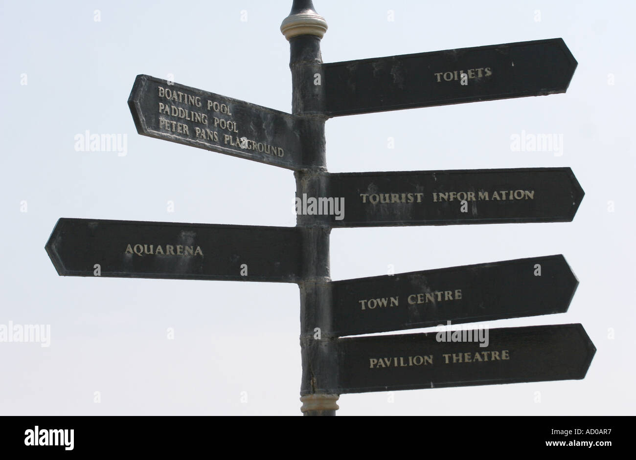 seaside directions sign for amenities Stock Photo - Alamy