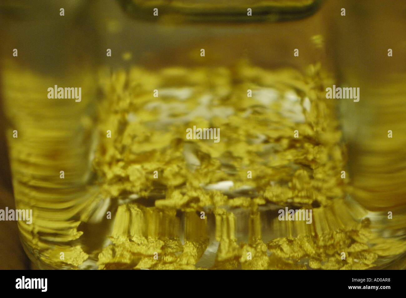 gold golden goldwasser gold water drink alcohol detail abstract colour ...