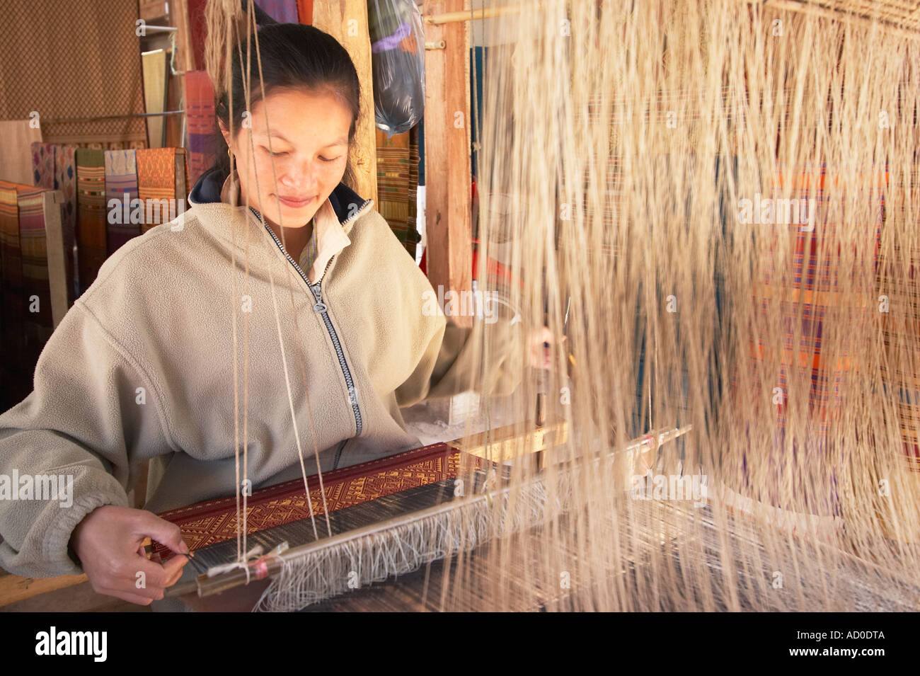 Woman at lao loom hi-res stock photography and images - Alamy