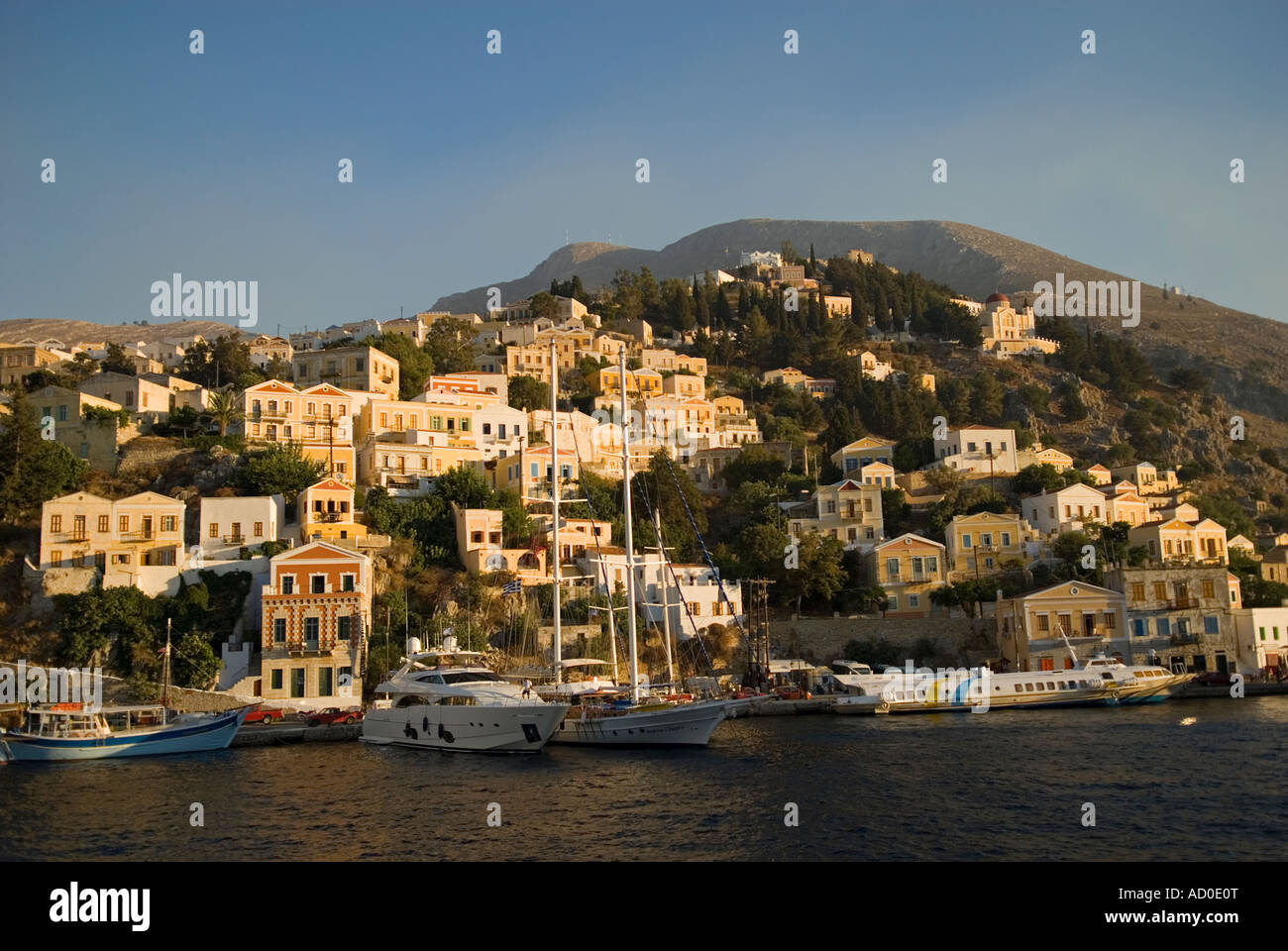 Simi Island, houses and harbor, Greece Stock Photo - Alamy