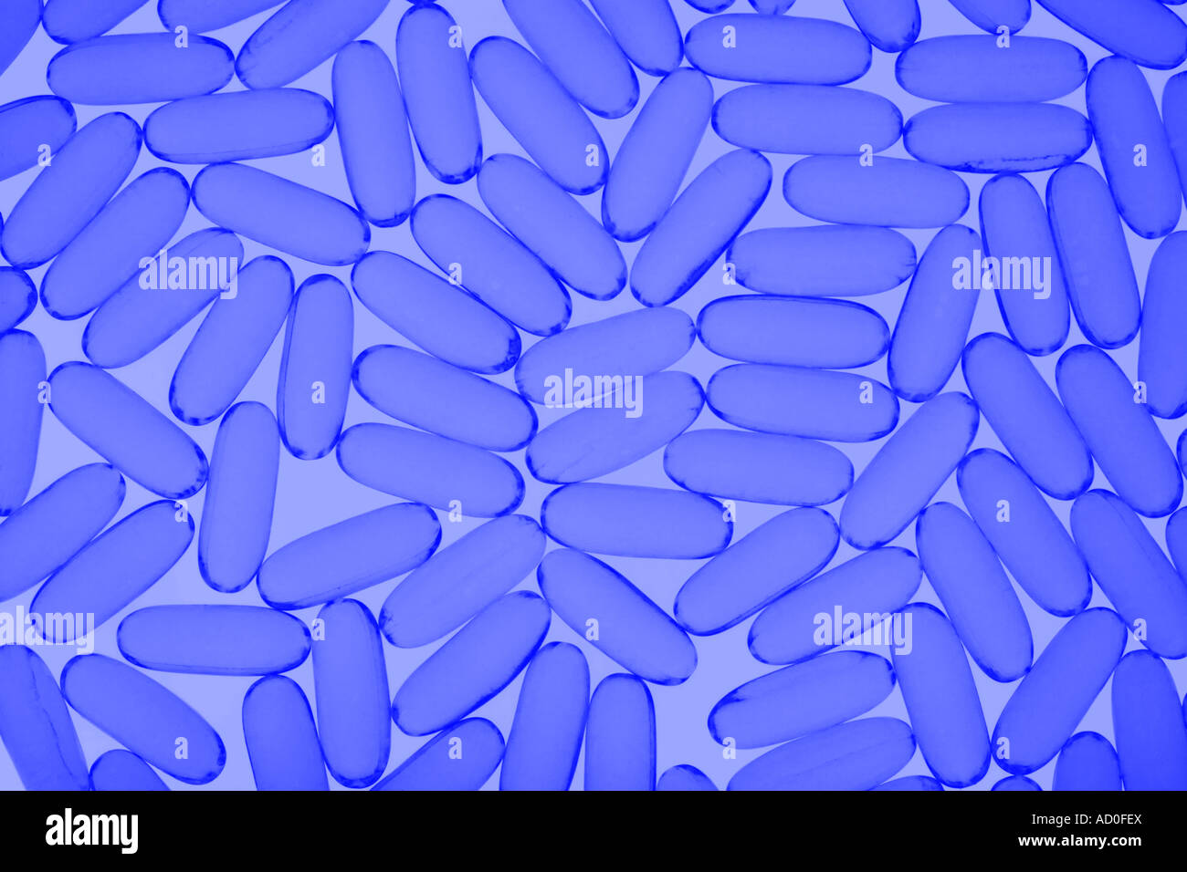 Clear blue pills Stock Photo - Alamy