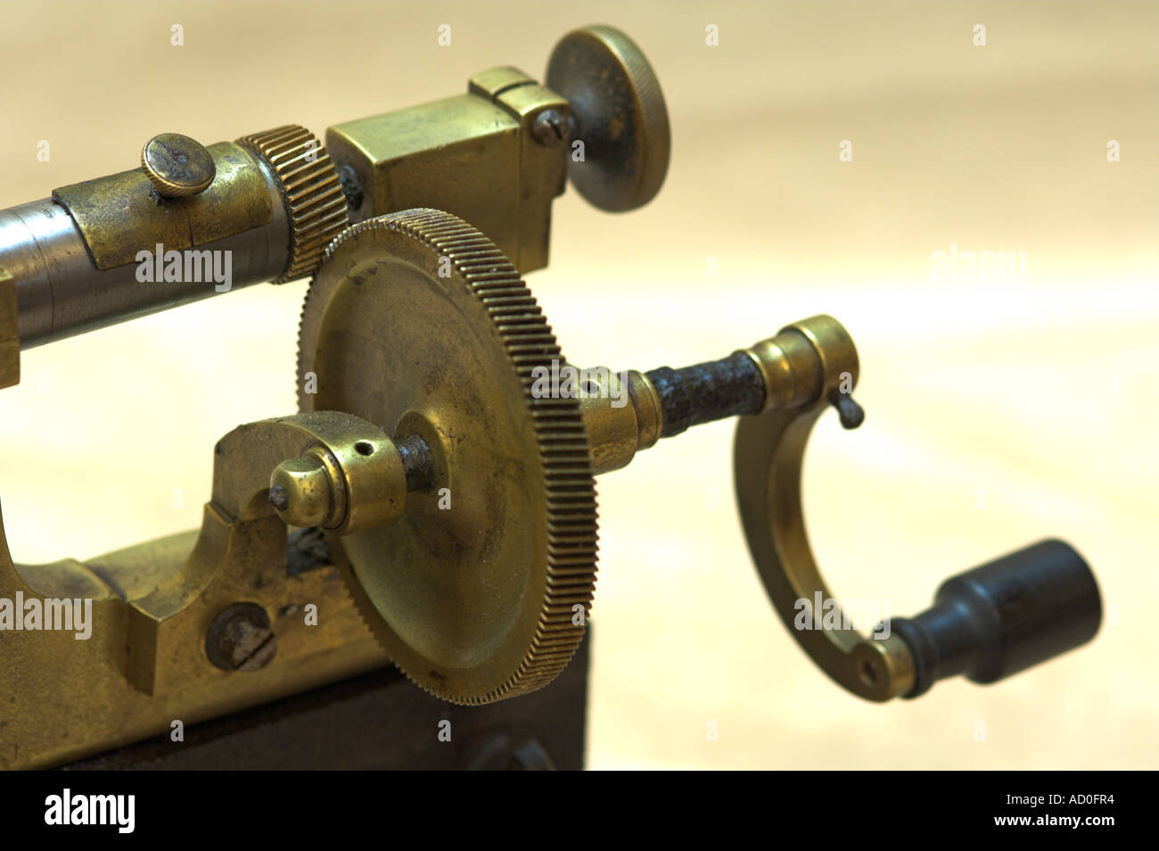 Closeup of "hand cranked" antique watchmakers mandrel Stock Photo - Alamy