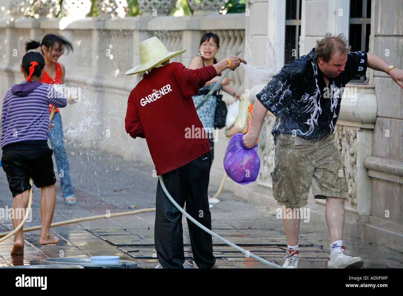 Throwing water girl hi-res stock photography and images - Alamy