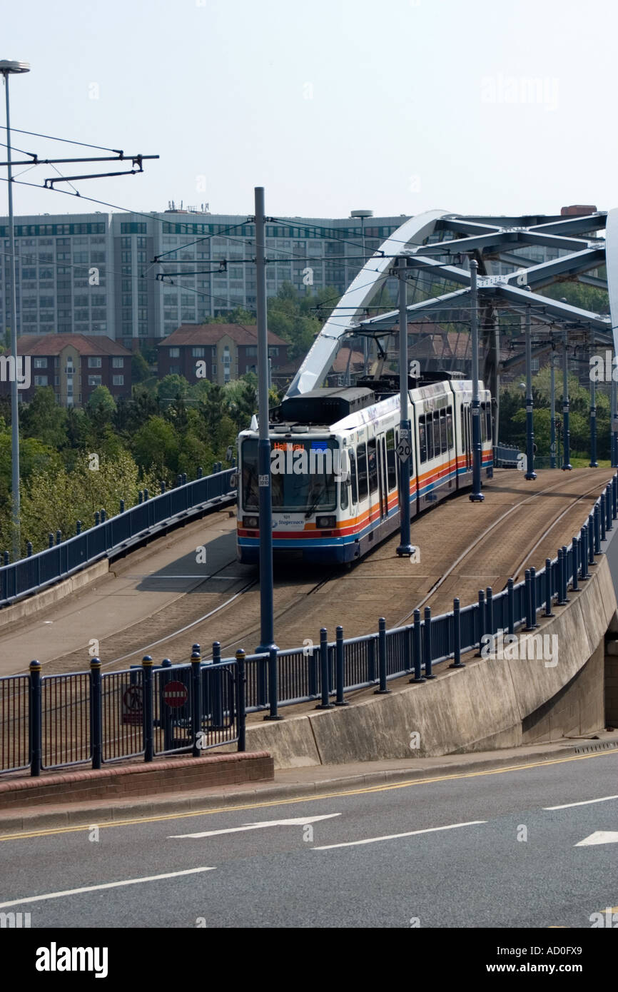 Sheffield Supertram passing over Commercial Street Bridge Stock Photo ...