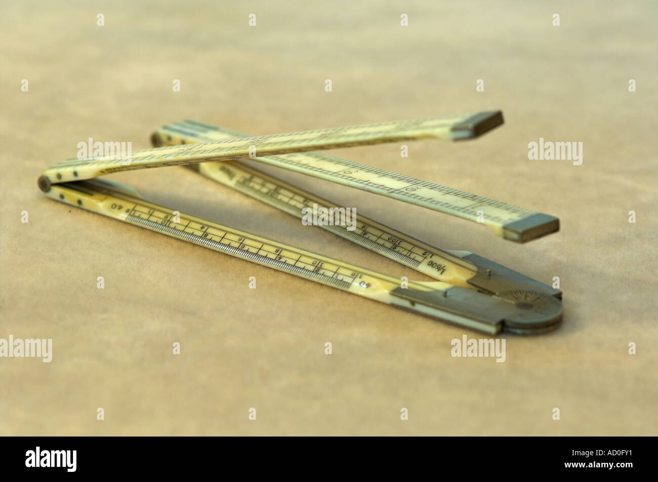 Antique four fold ivory and brass architects rule Stock Photo - Alamy