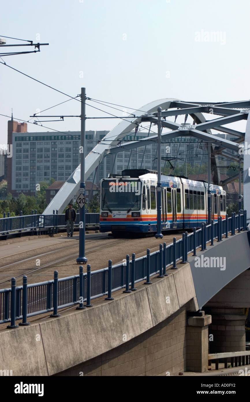 Sheffield Supertram passing over Commercial Street Bridge Stock Photo ...