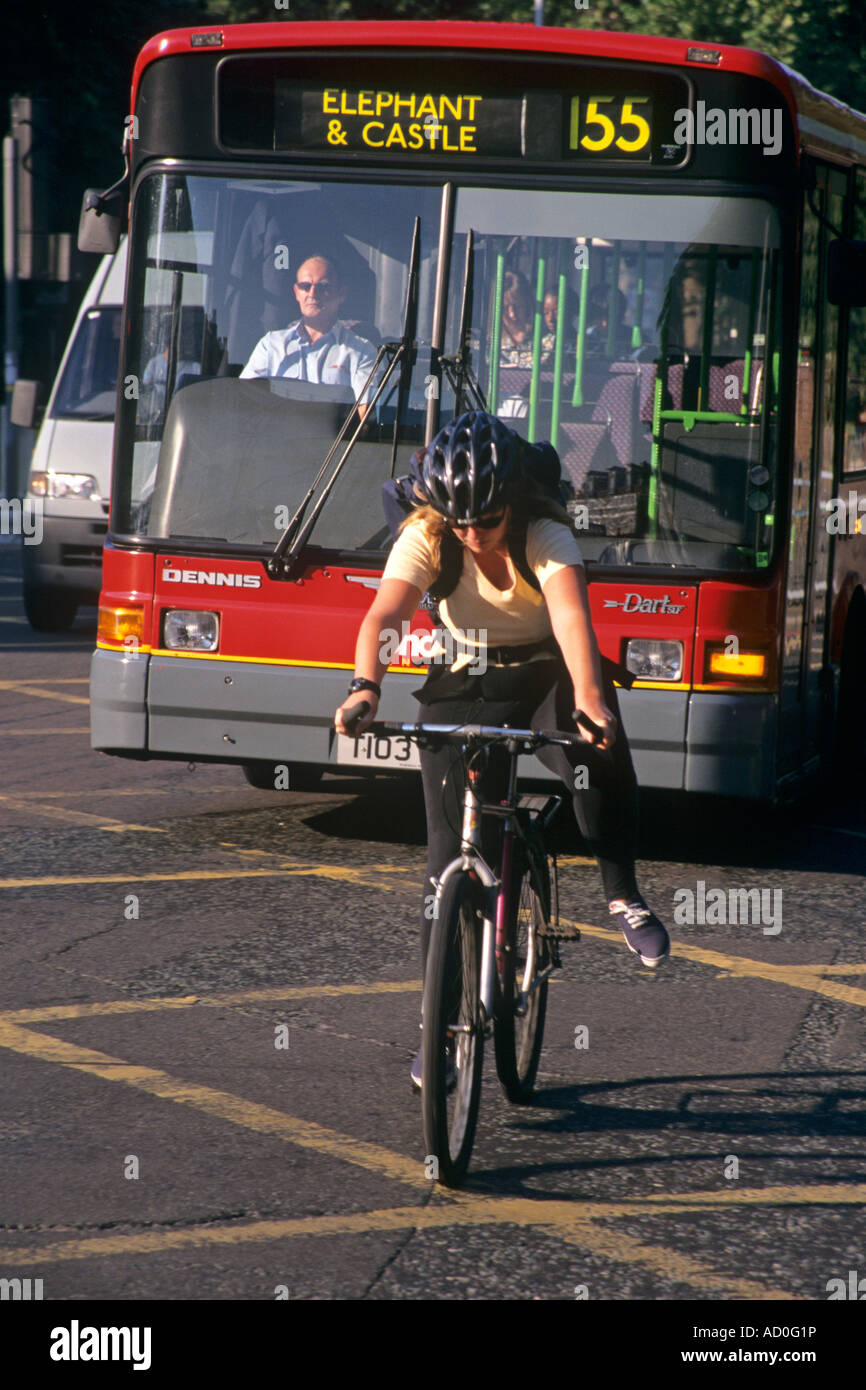 Bus cyclist London England UK Stock Photo - Alamy