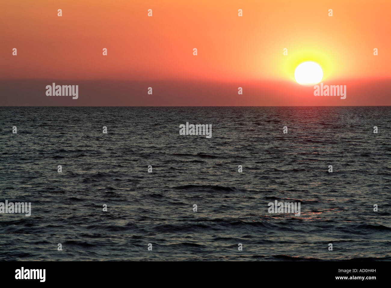 Evening sunset over ocean hi-res stock photography and images - Alamy