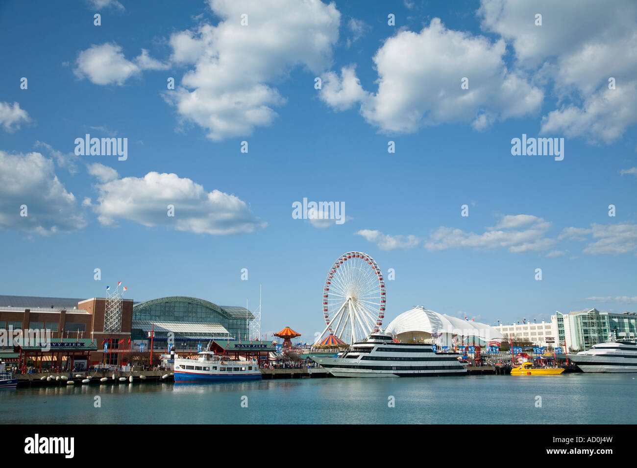 CHICAGO Illinois Water taxis and boats dock at Navy Pier Ferris wheel ...