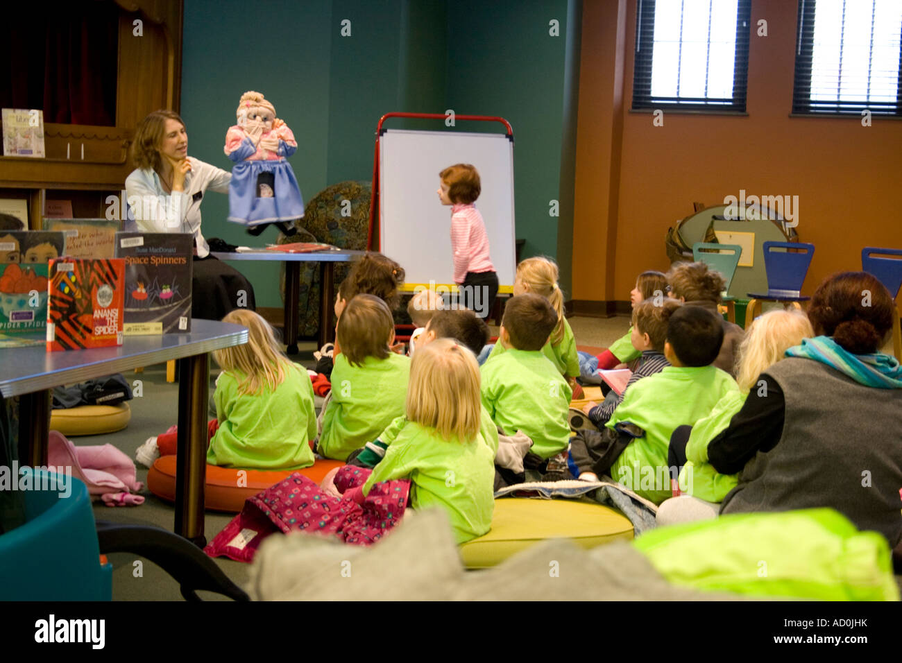 Telling a story to children with puppet hi-res stock photography and ...