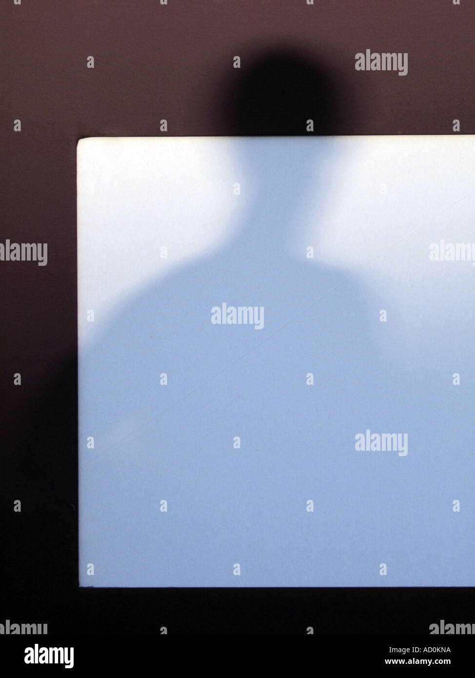 statue's shadow on wall Stock Photo - Alamy