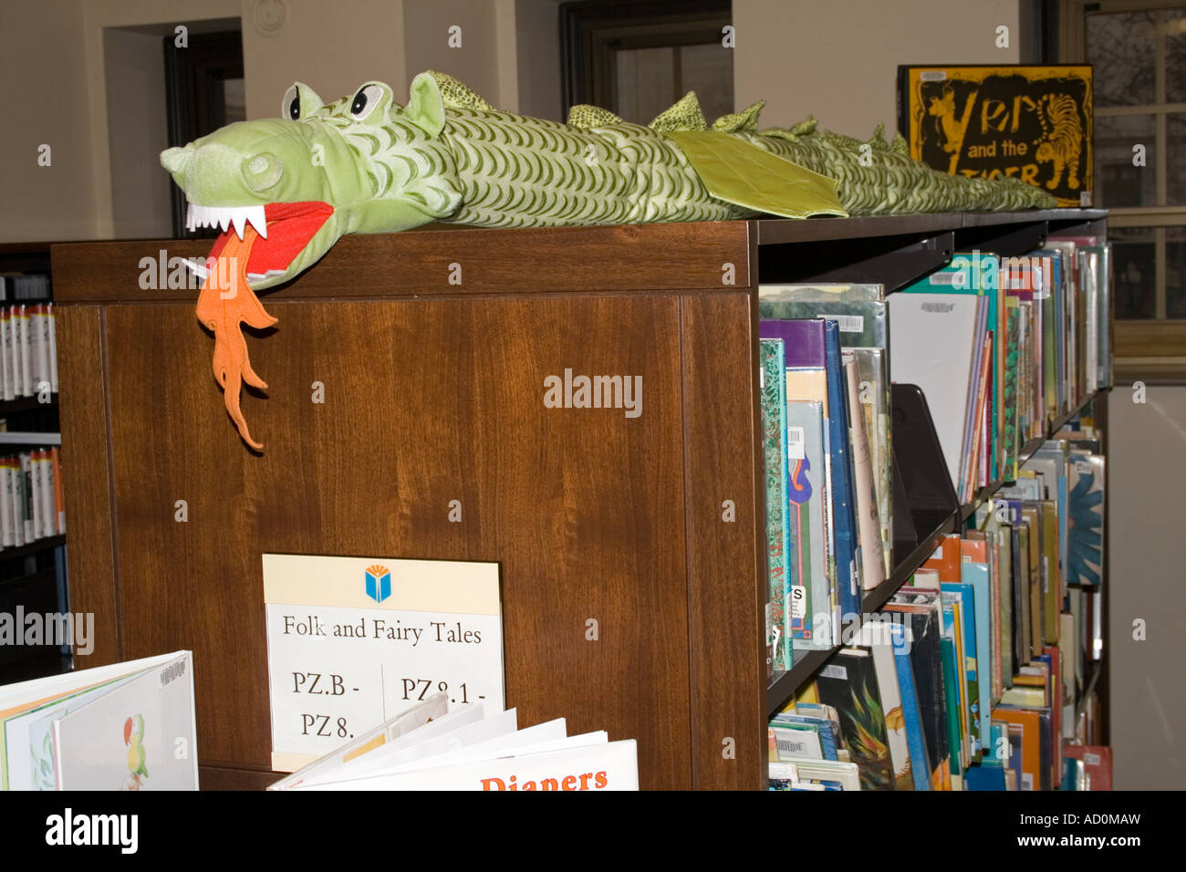 Dragon guarding childrens book at the library. James J. Hill Reference ...