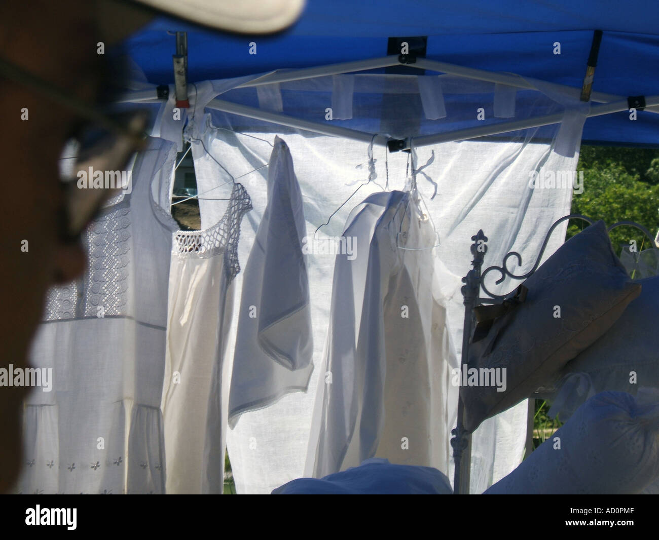 white dresses on market stall Stock Photo - Alamy