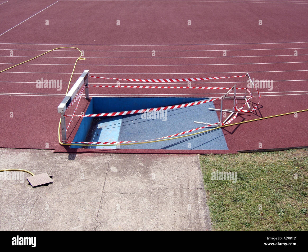 steeplechase hurdle water pit blocked with red and white tape Stock ...